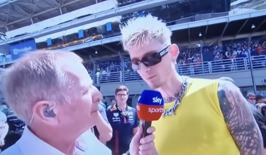 Machine Gun Kelly Martin Brundle Thumbs Down on F1 Grid Walk